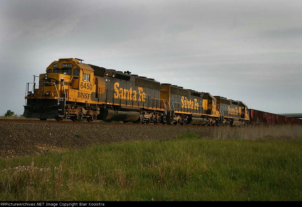 BNSF 6450 waits for a new crew with two sister SD45-2's at Haslet